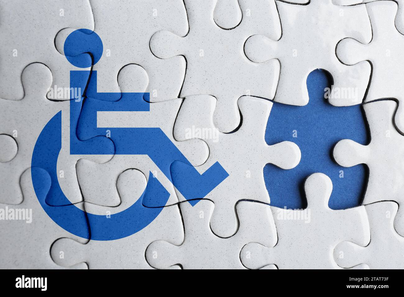 Inclusion concept. White puzzle with international symbol of access and ...