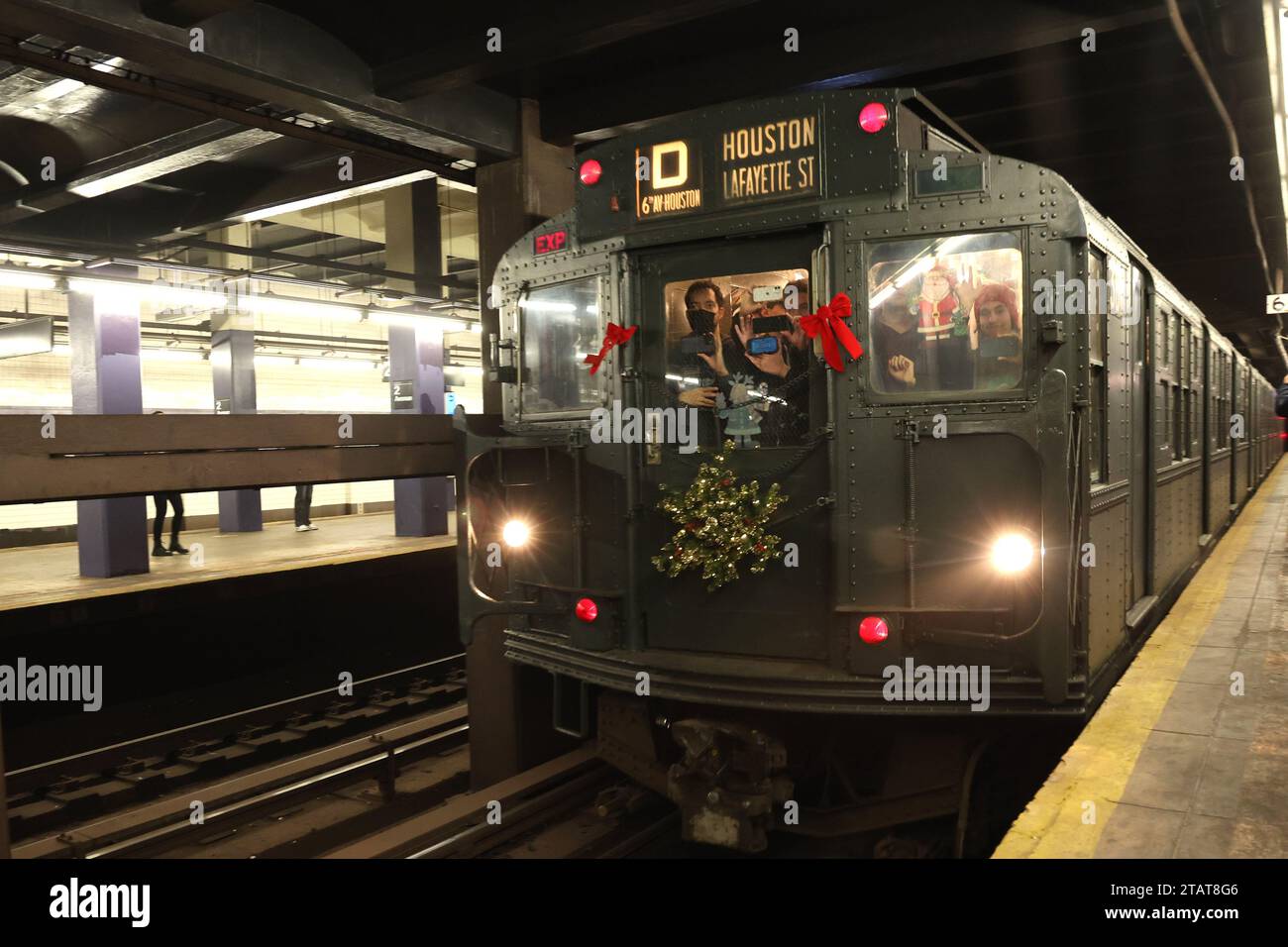 The Holiday Nostalgia Ride subway pulls into the station on December 2 ...