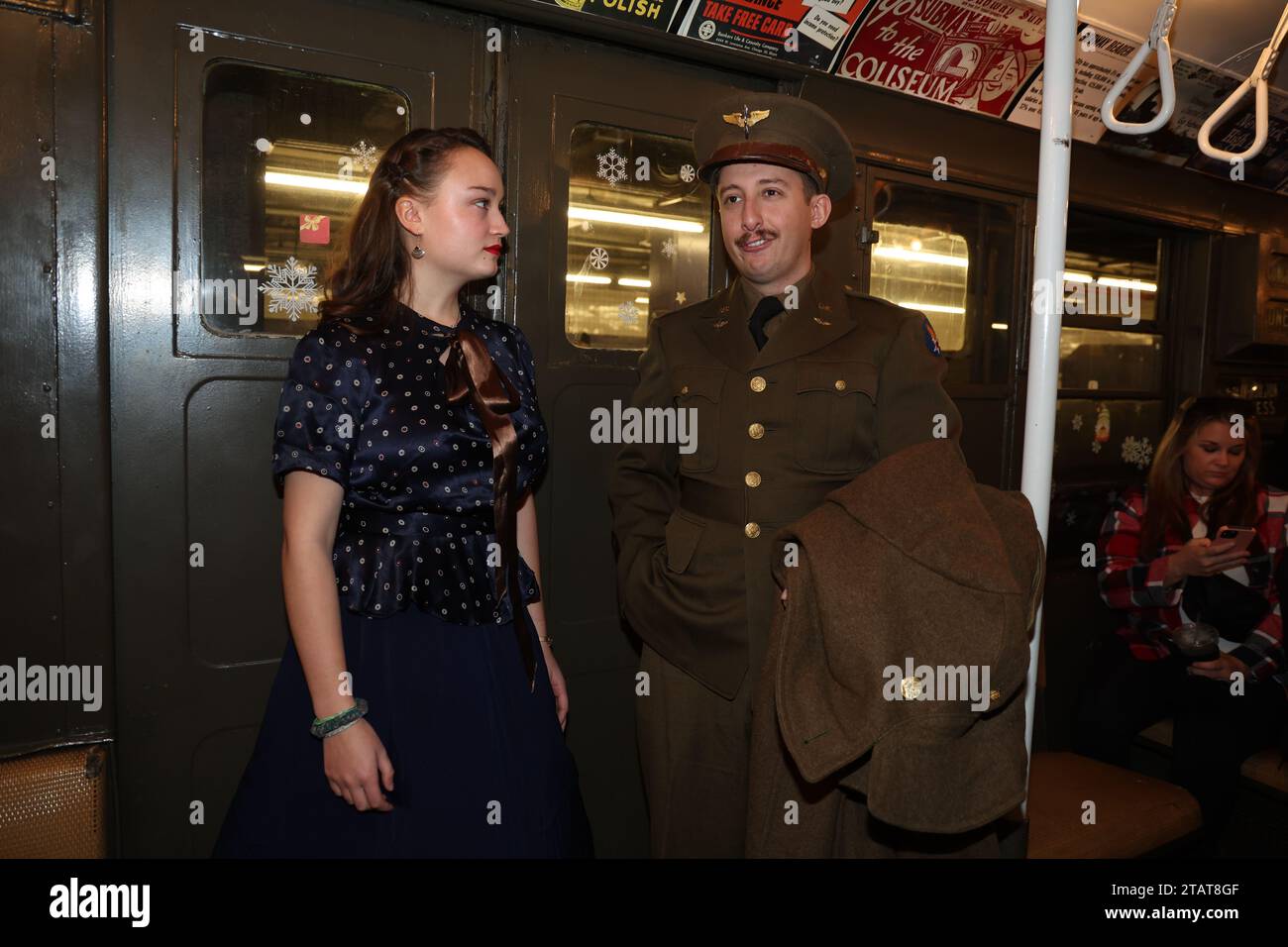 Cosplayers dressed in vintage clothing participate in the Holiday ...