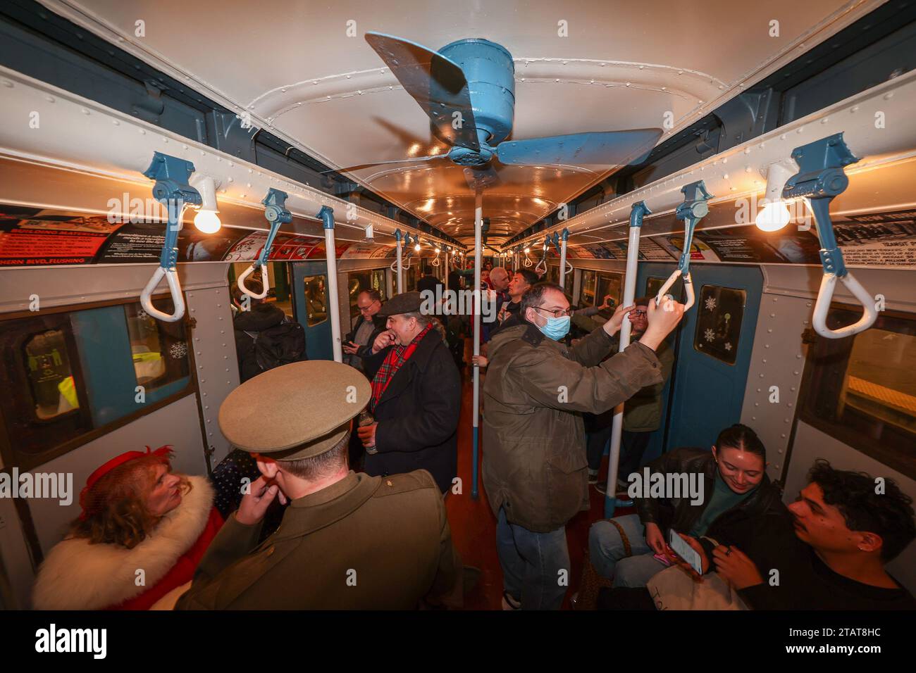 People ride on board the Holiday Nostalgia Rides hosted by the New York ...