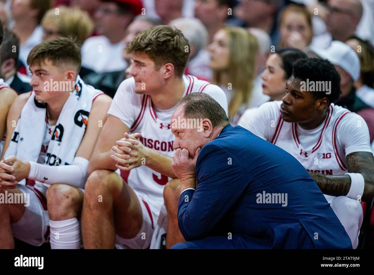 Wisconsin coach Greg Gard watches along with Connor Essegian, left ...