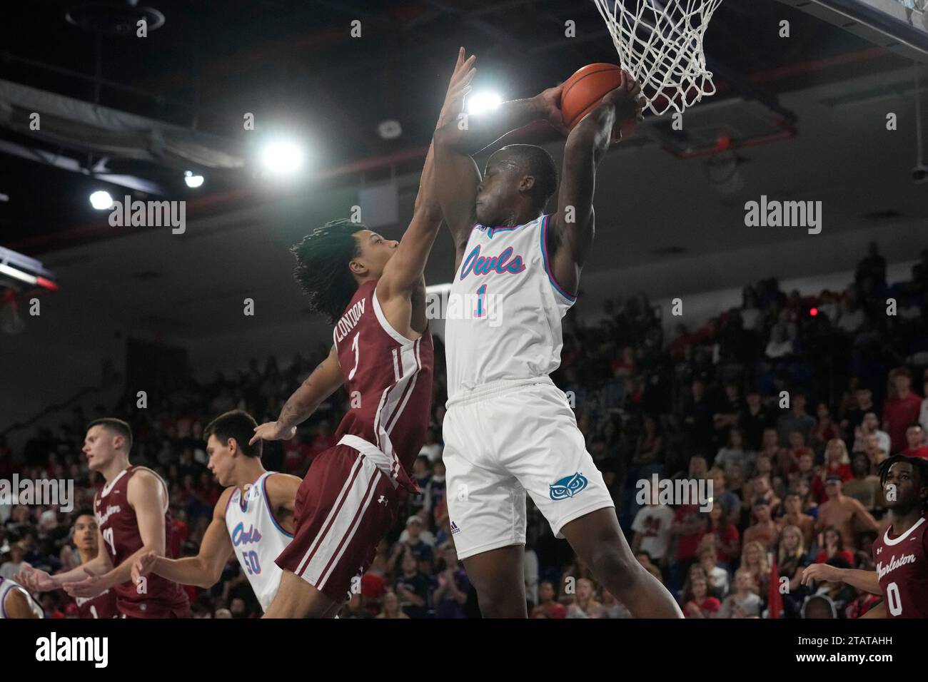 Florida Atlantic guard Johnell Davis (1) grabs a rebound over ...