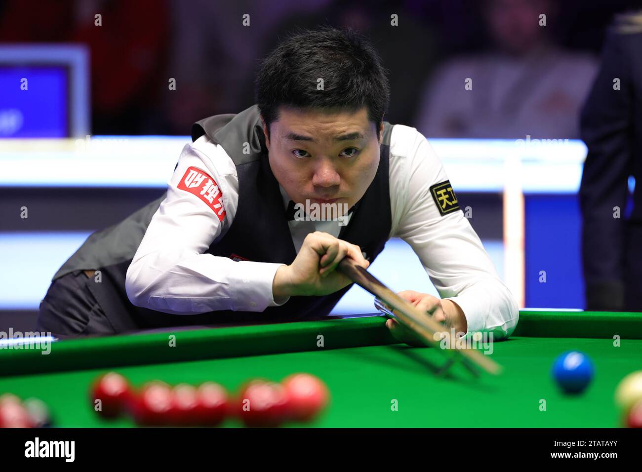 York, Britain. 2nd Dec, 2023. Ding Junhui of China competes during the ...