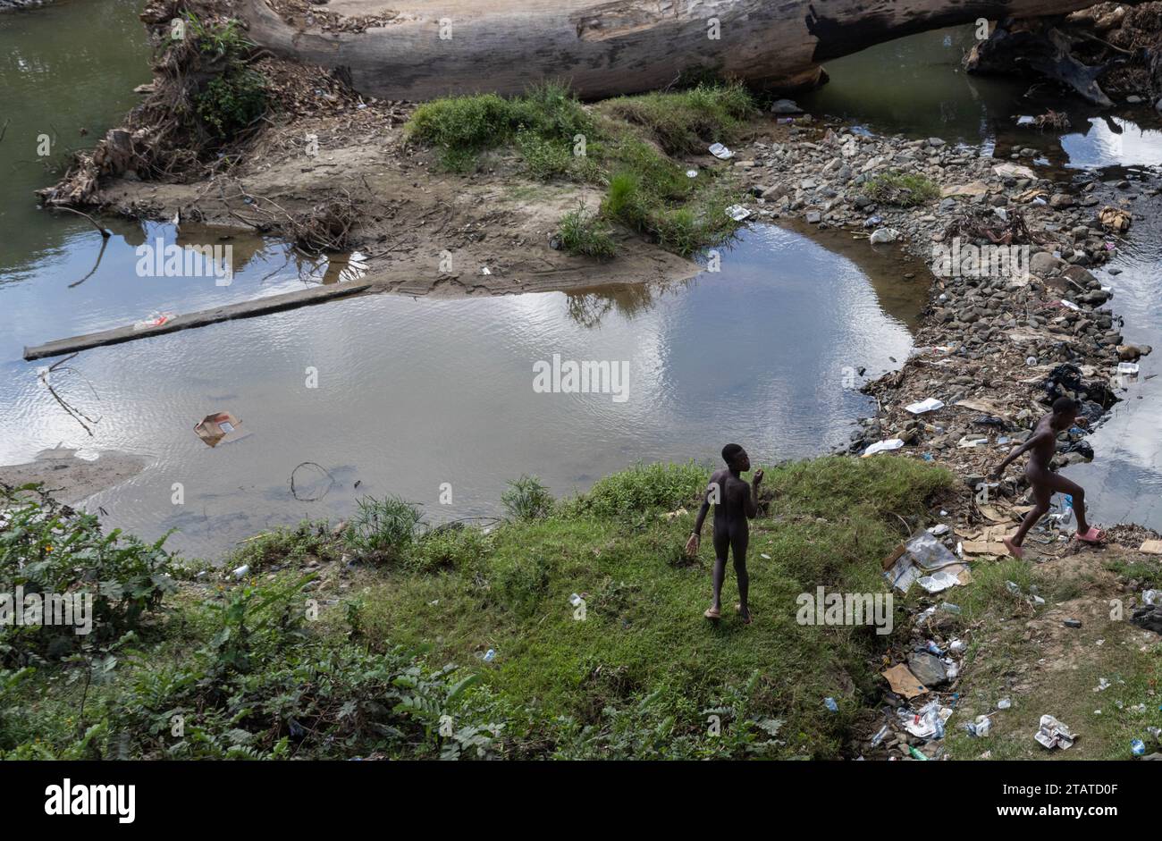Haitian boys play play on the Massacre River between the Dominican ...