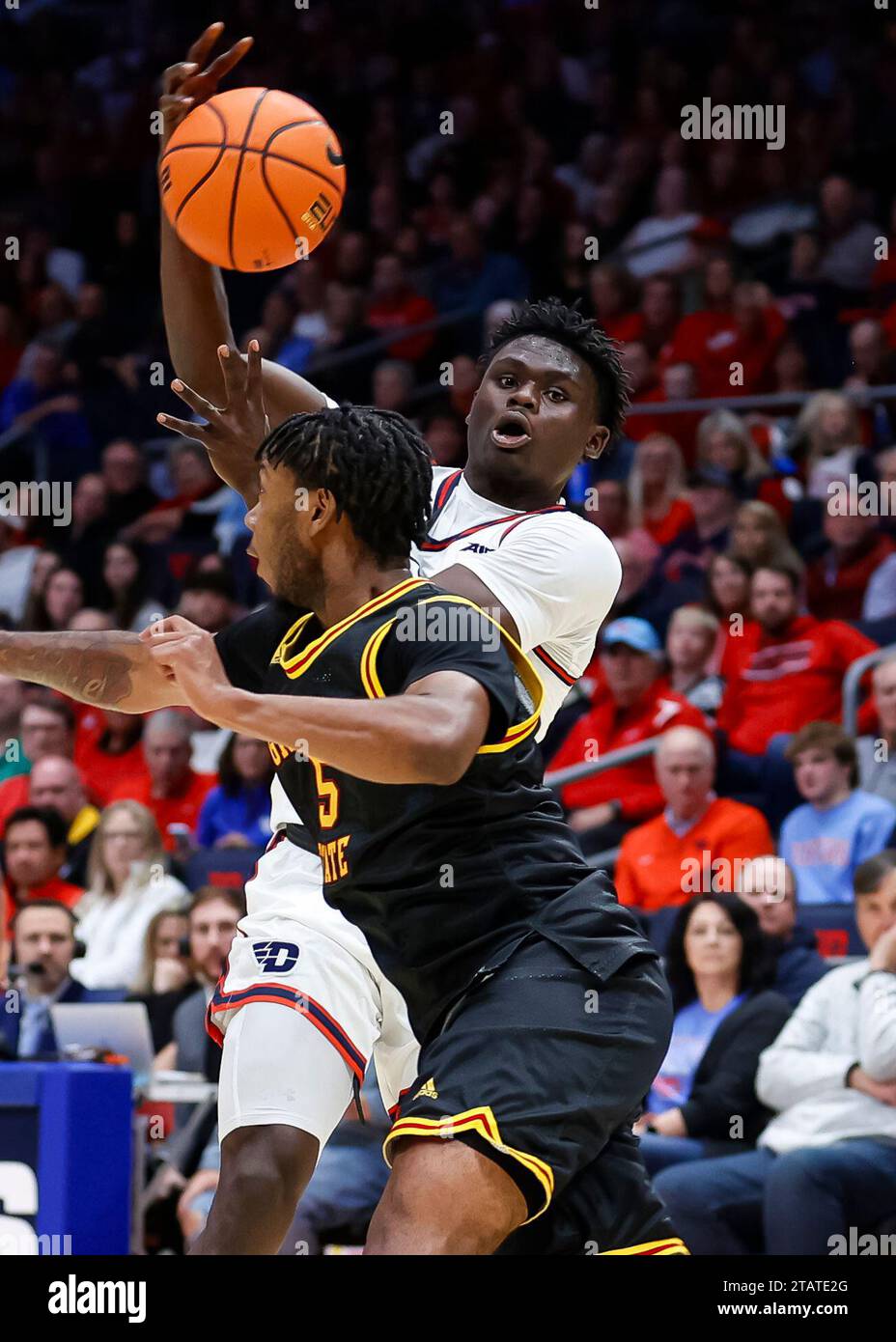Dayton, USA. 02nd Dec, 2023. Enoch Cheeks (6) moves the ball up court ...