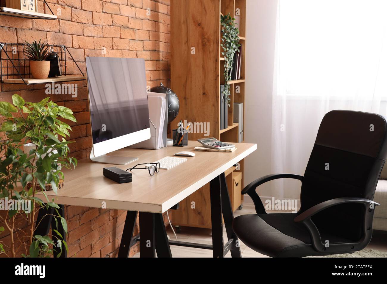 Blank computer monitor with stationery on table in office Stock Photo ...