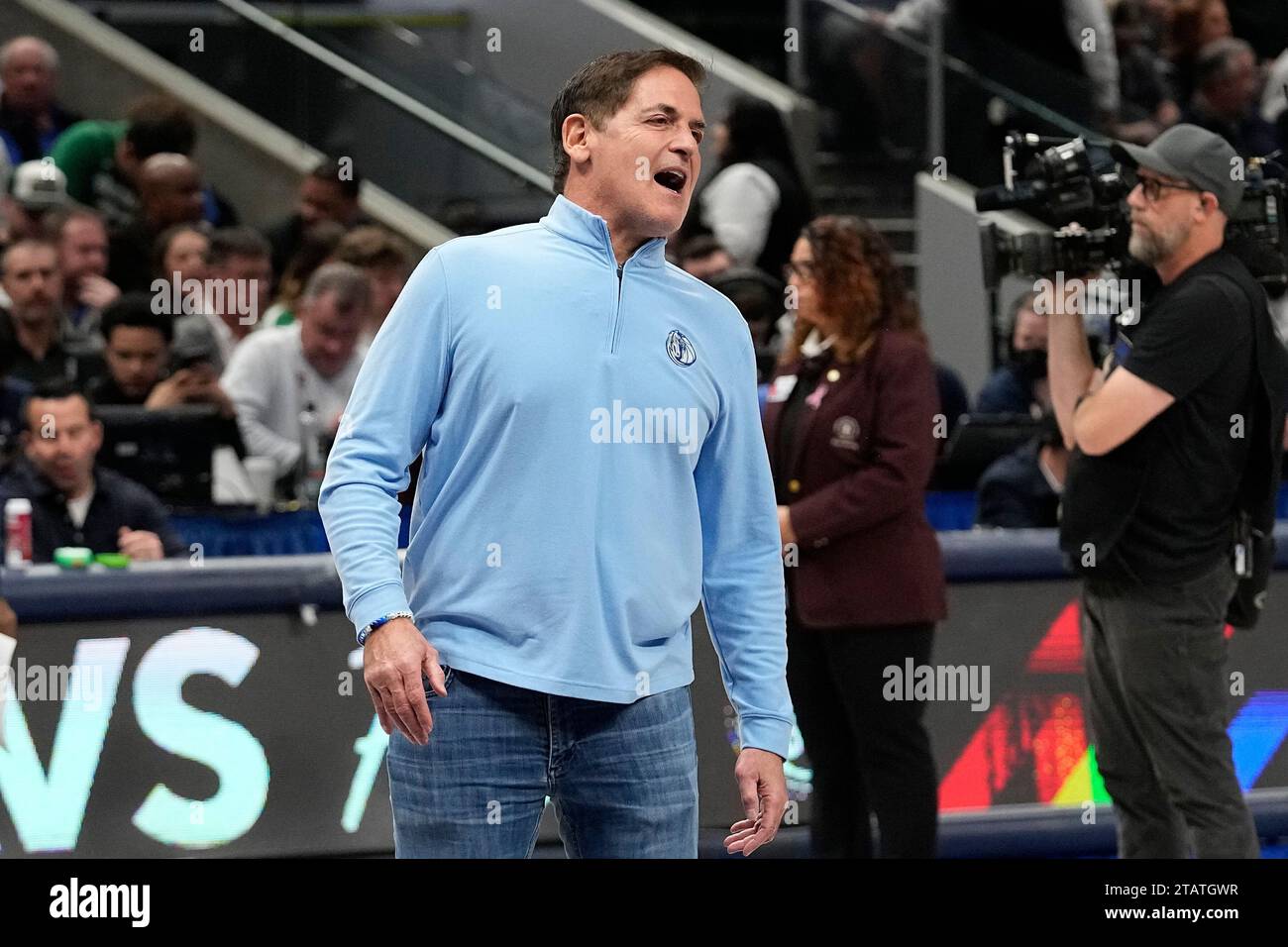 Dallas Mavericks owner Marc Cuban yells at a referee during the first ...