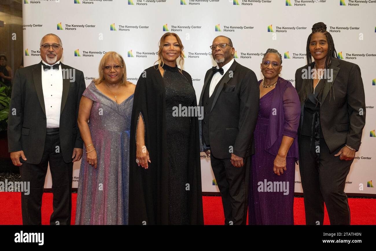 Queen Latifah and family pose for a group photo as they arrive for the ...