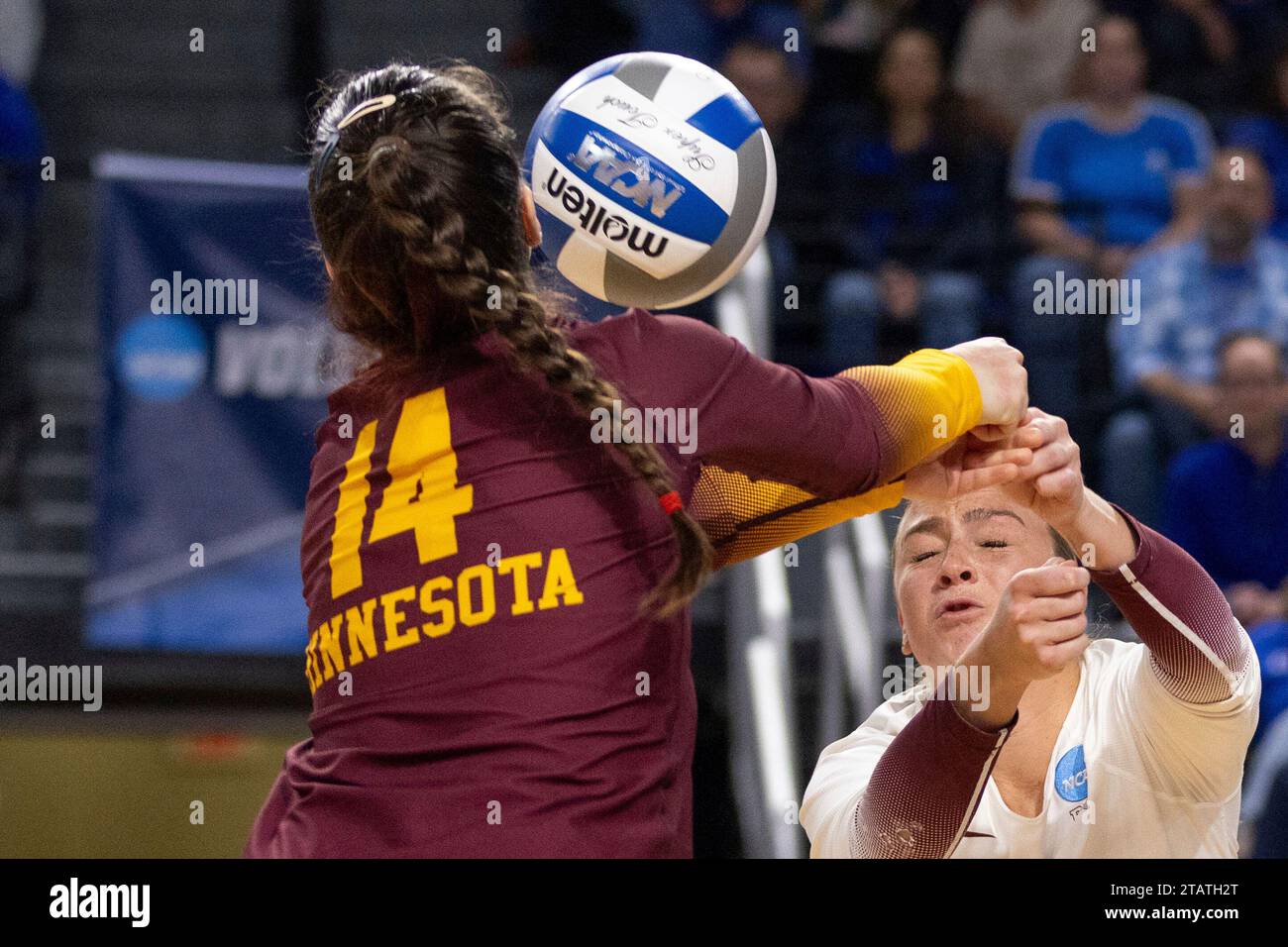 Minnesota's Zeynep Palabiyik (14) and Kylie Murr (6) both go for the ...