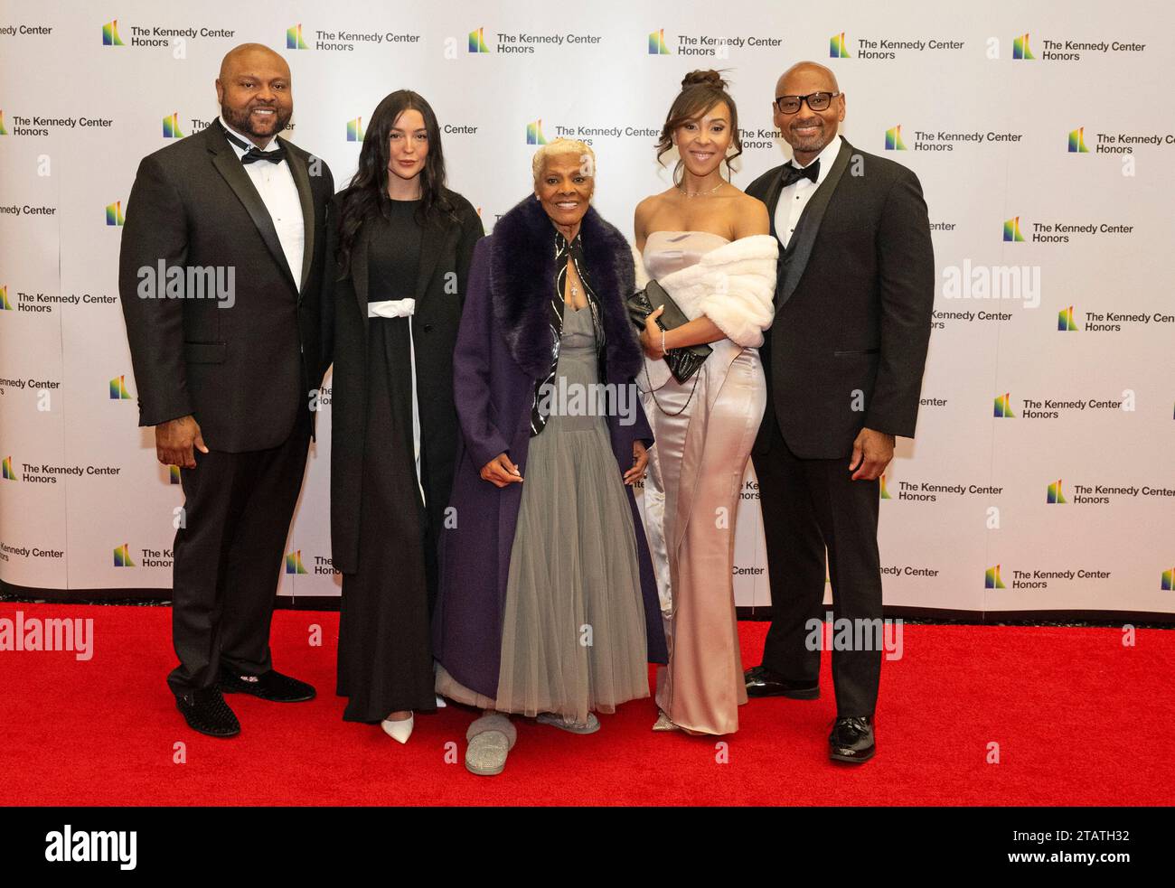 Dionne Warwick, center, poses with members of her family as she arrives for the Medallion ...