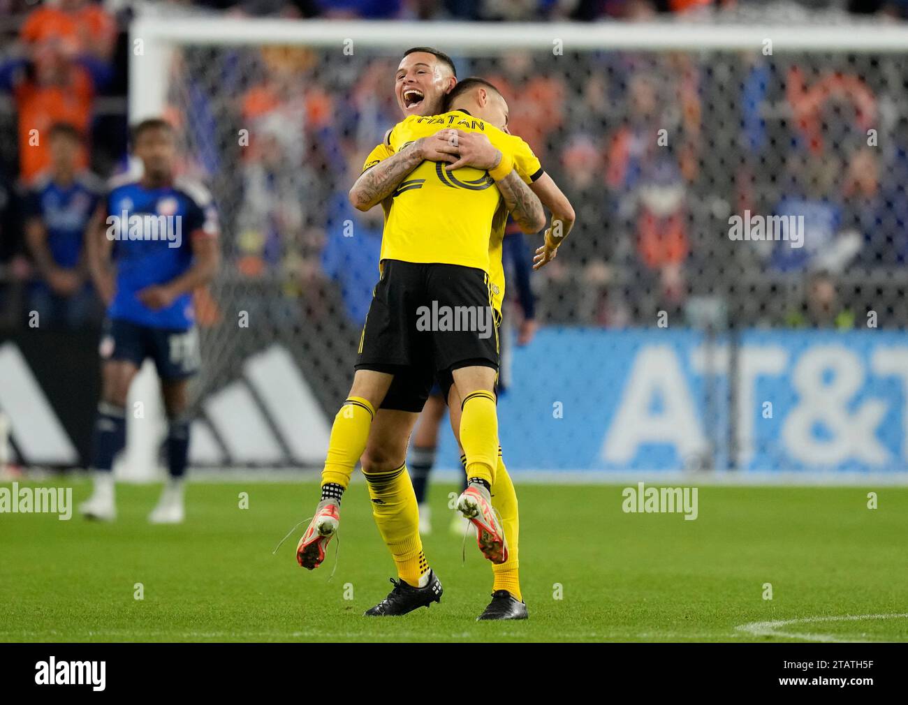 Columbus Crew forward Christian Ramirez (17) lifts midfielder Alexandru ...