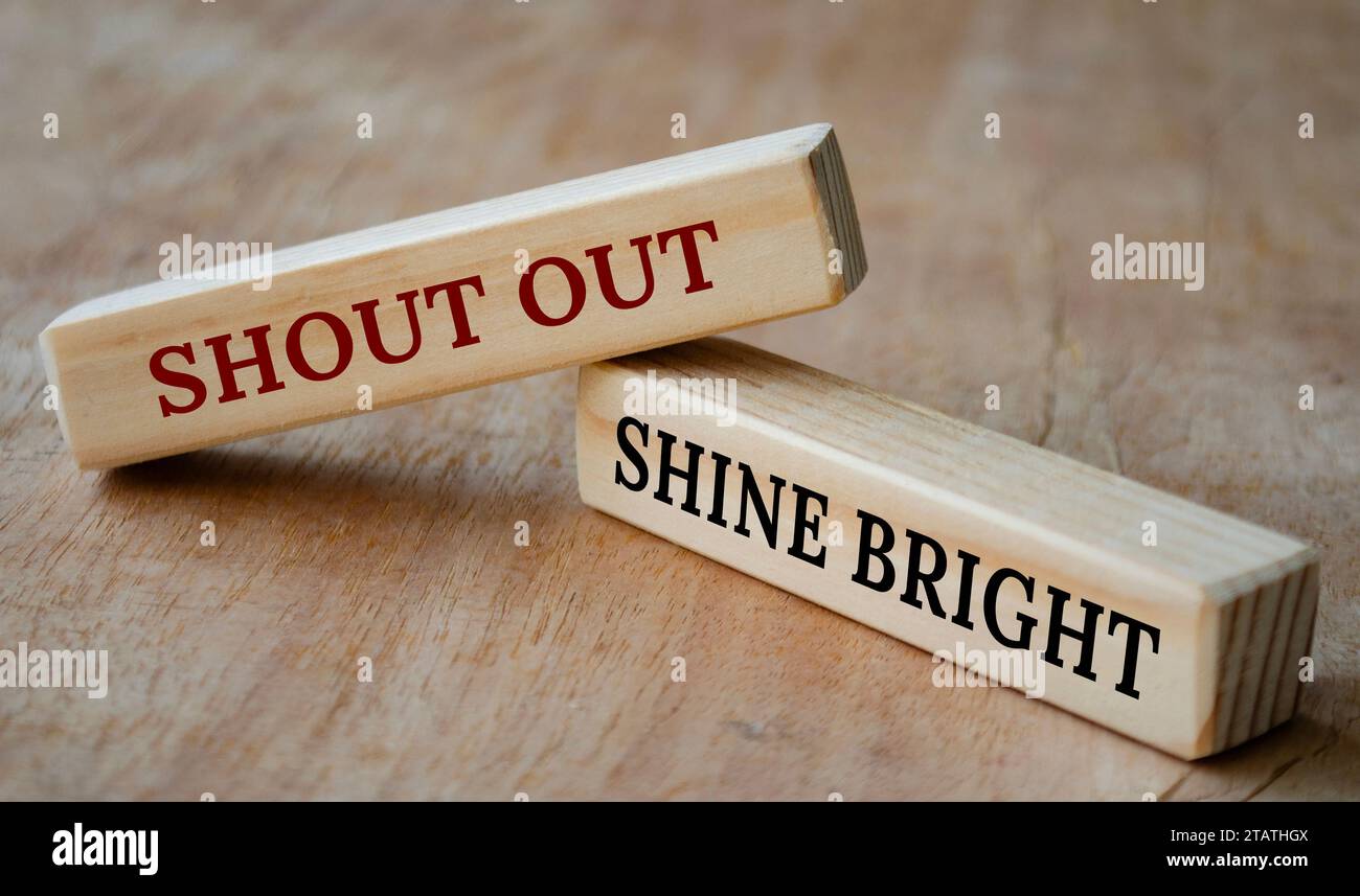 Stand out, shine bright text on wooden blocks. Business concept Stock ...