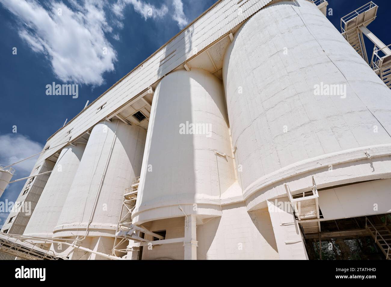 Concrete silos for storage of limestone products at plant Stock Photo ...