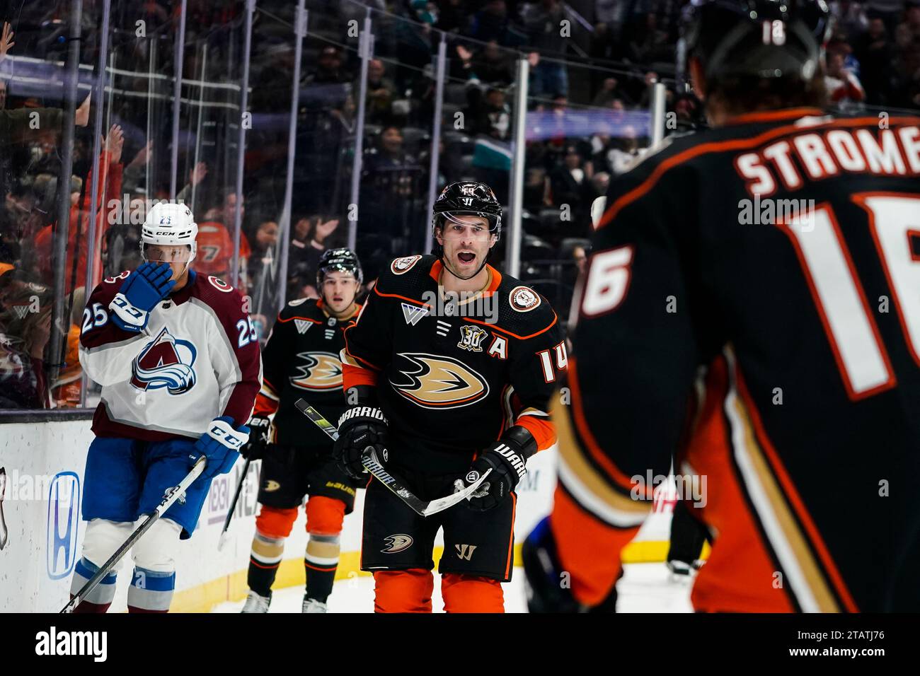Anaheim Ducks center Adam Henrique, center, celebrates his goal with ...