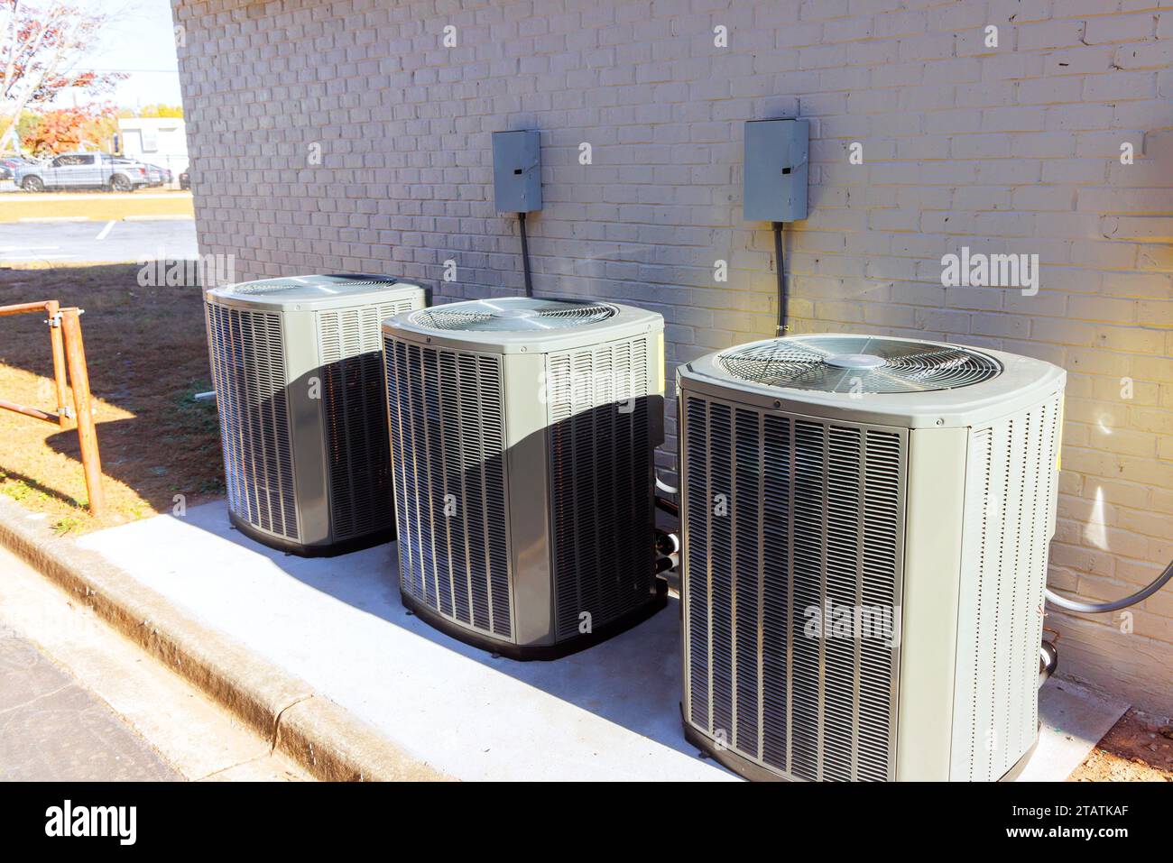 An outdoor air conditioning units has been installed on exterior facade ...