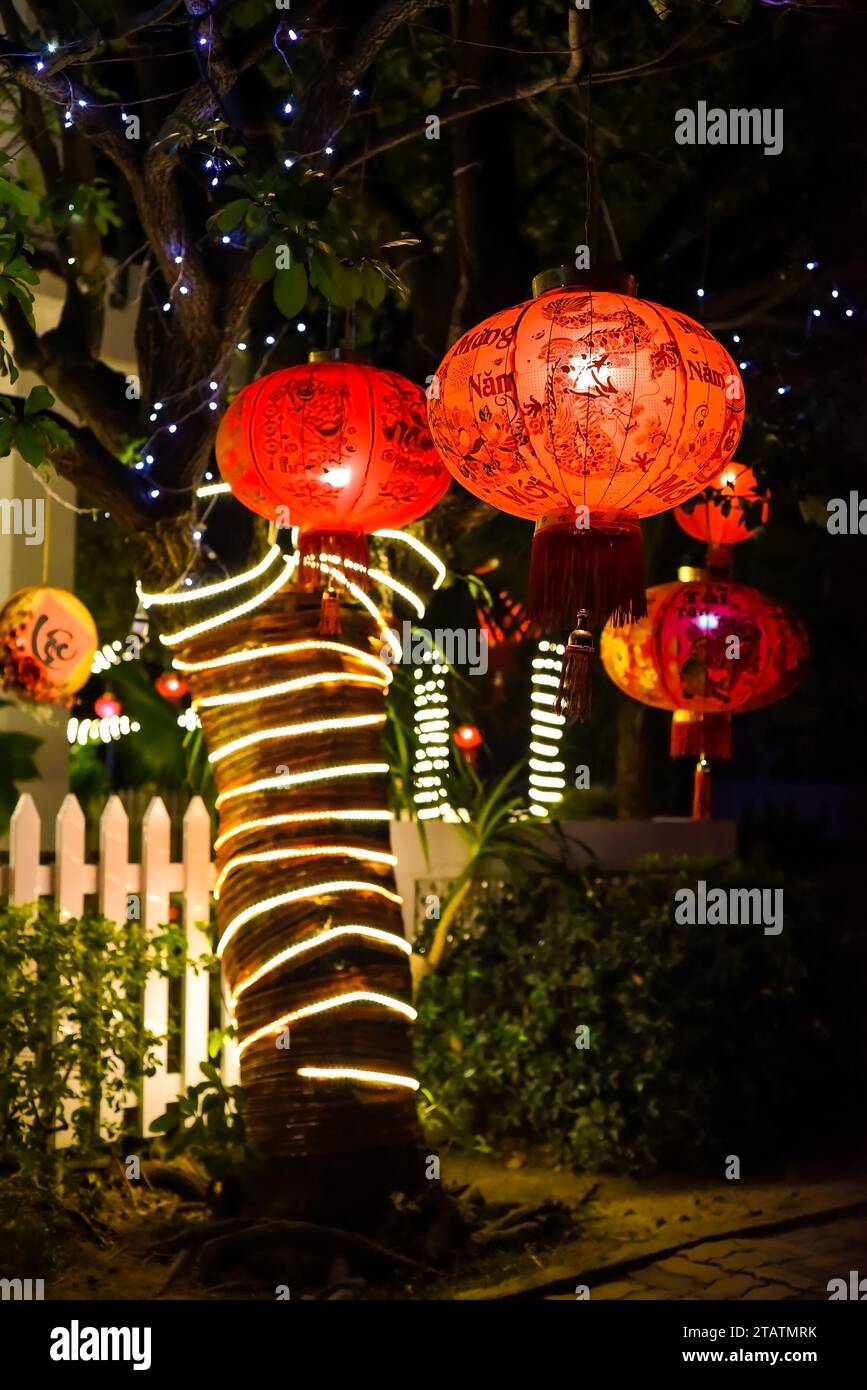 Many red lanterns with vietnamese language translated as "Happy New ...
