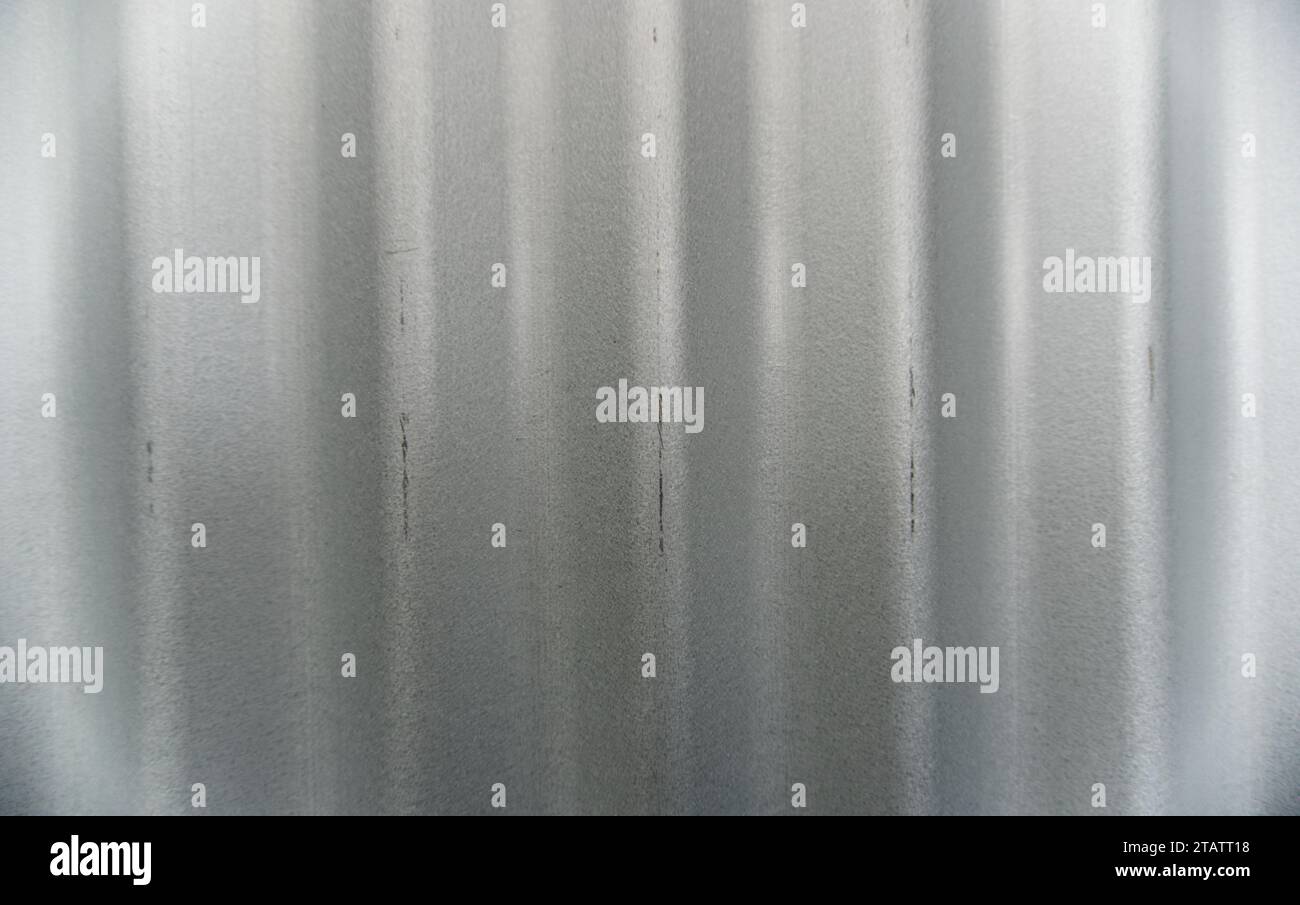 A sheet of grey corrugated iron has a mark on one of its ridges Stock ...