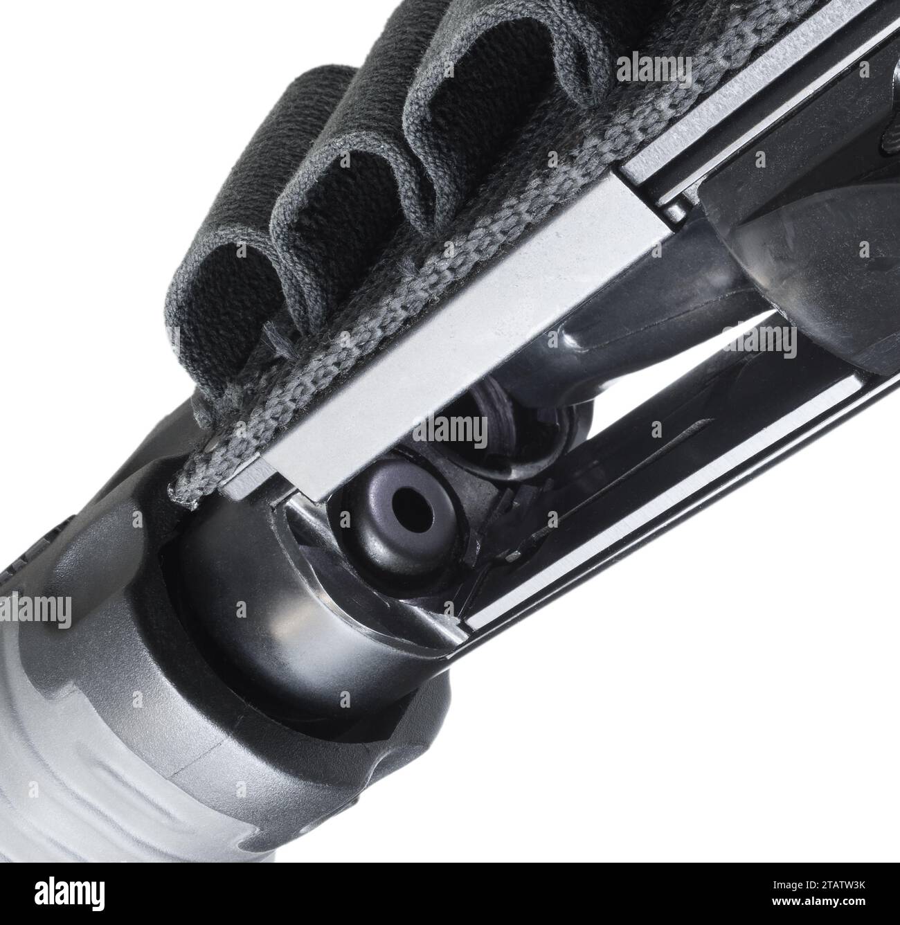 Self-defense shotgun that has been made safe with the empty chamber ...