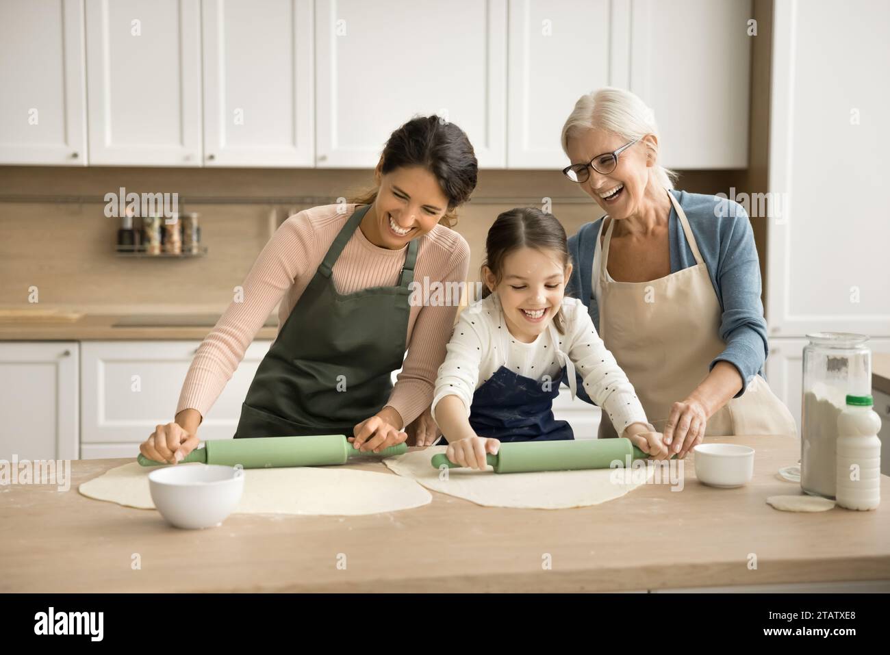 Happy adorable kid, mother and mature blonde grandma having fun Stock ...