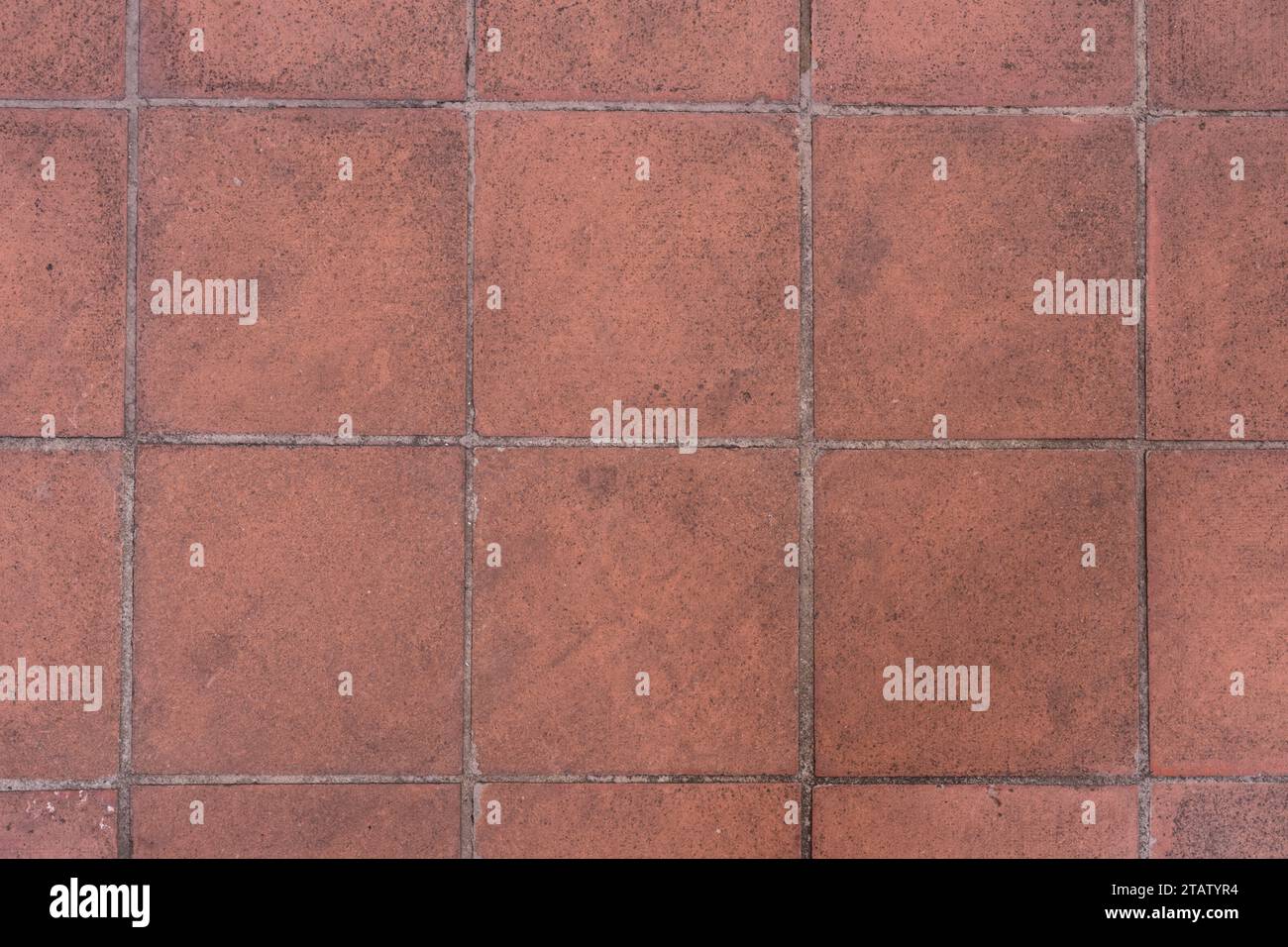 Reddish stone tile on pavement outdoor, backdrop Stock Photo - Alamy