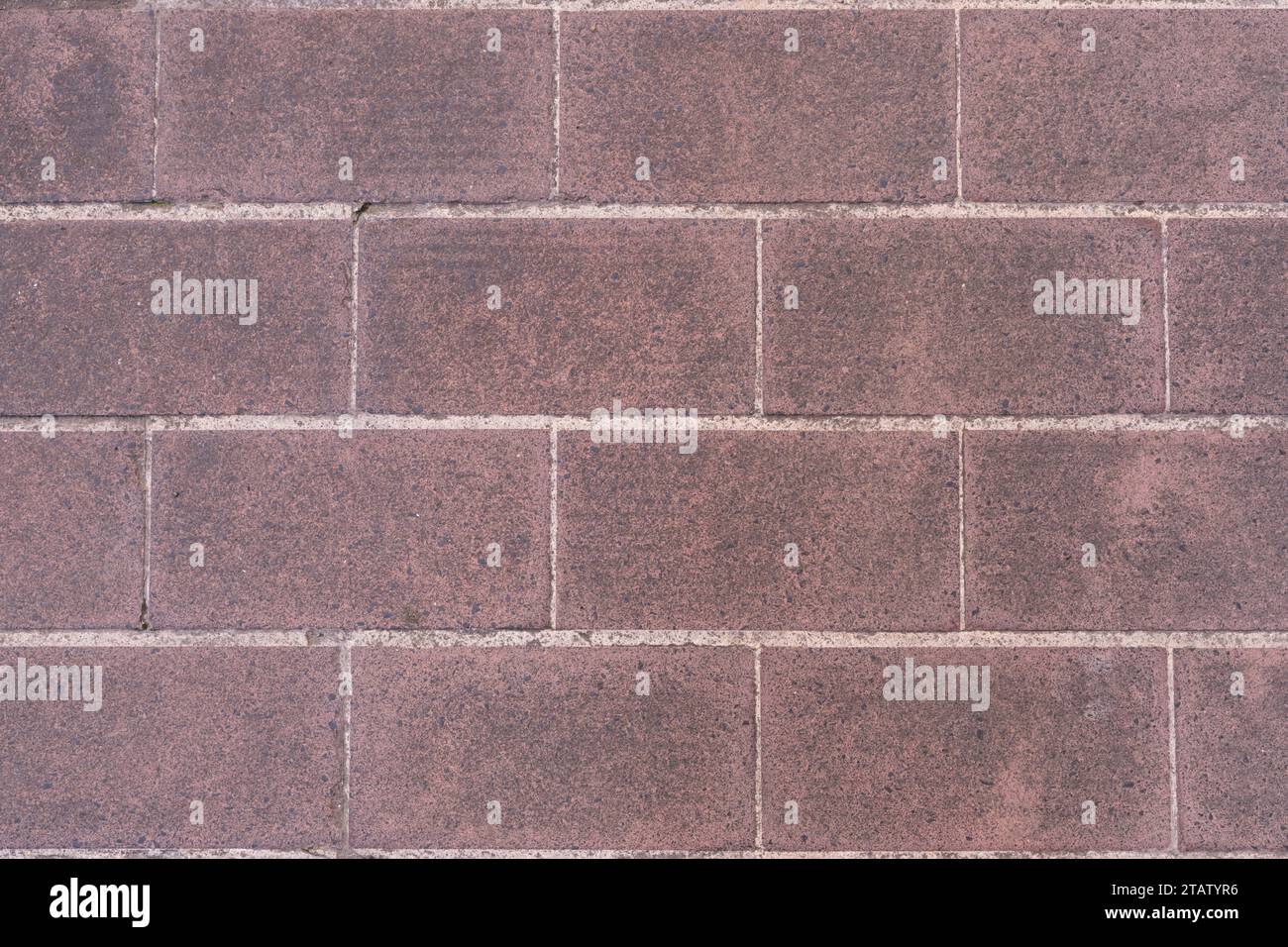 Reddish stone tile on pavement outdoor, backdrop Stock Photo - Alamy
