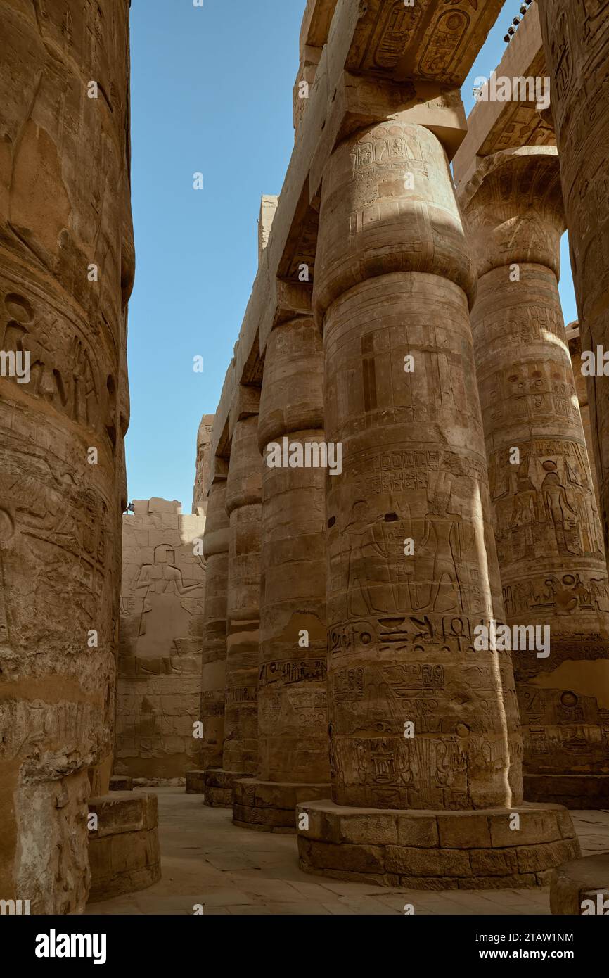 An image of two ornately carved columns depicting Egyptian men and ...