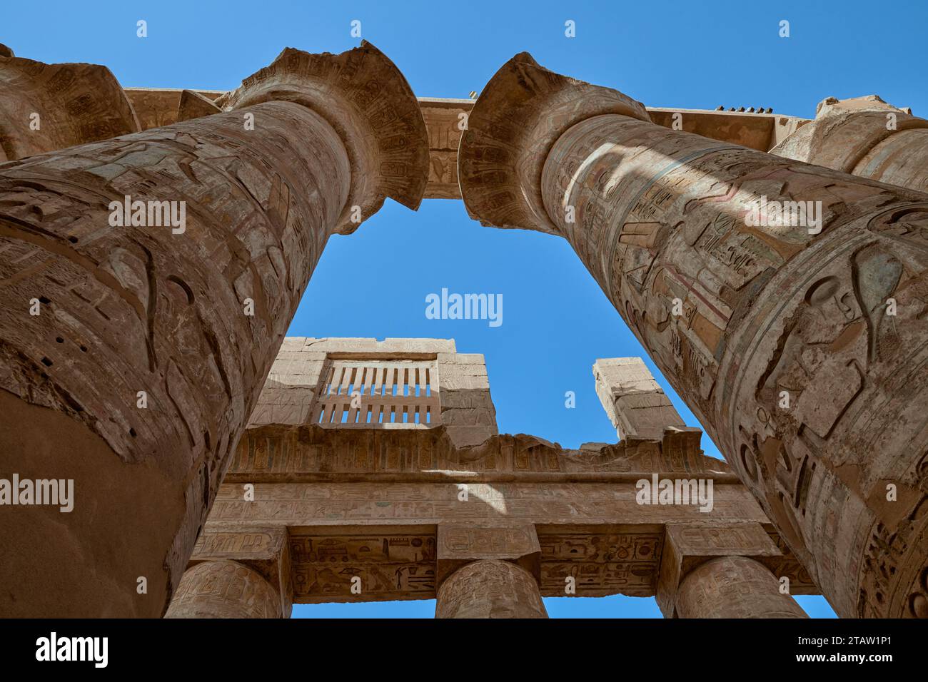 A photo of a tall ancient structure with ornate columns against a ...