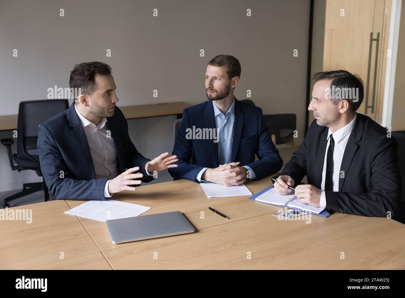 Group business partners gathered hi-res stock photography and images ...