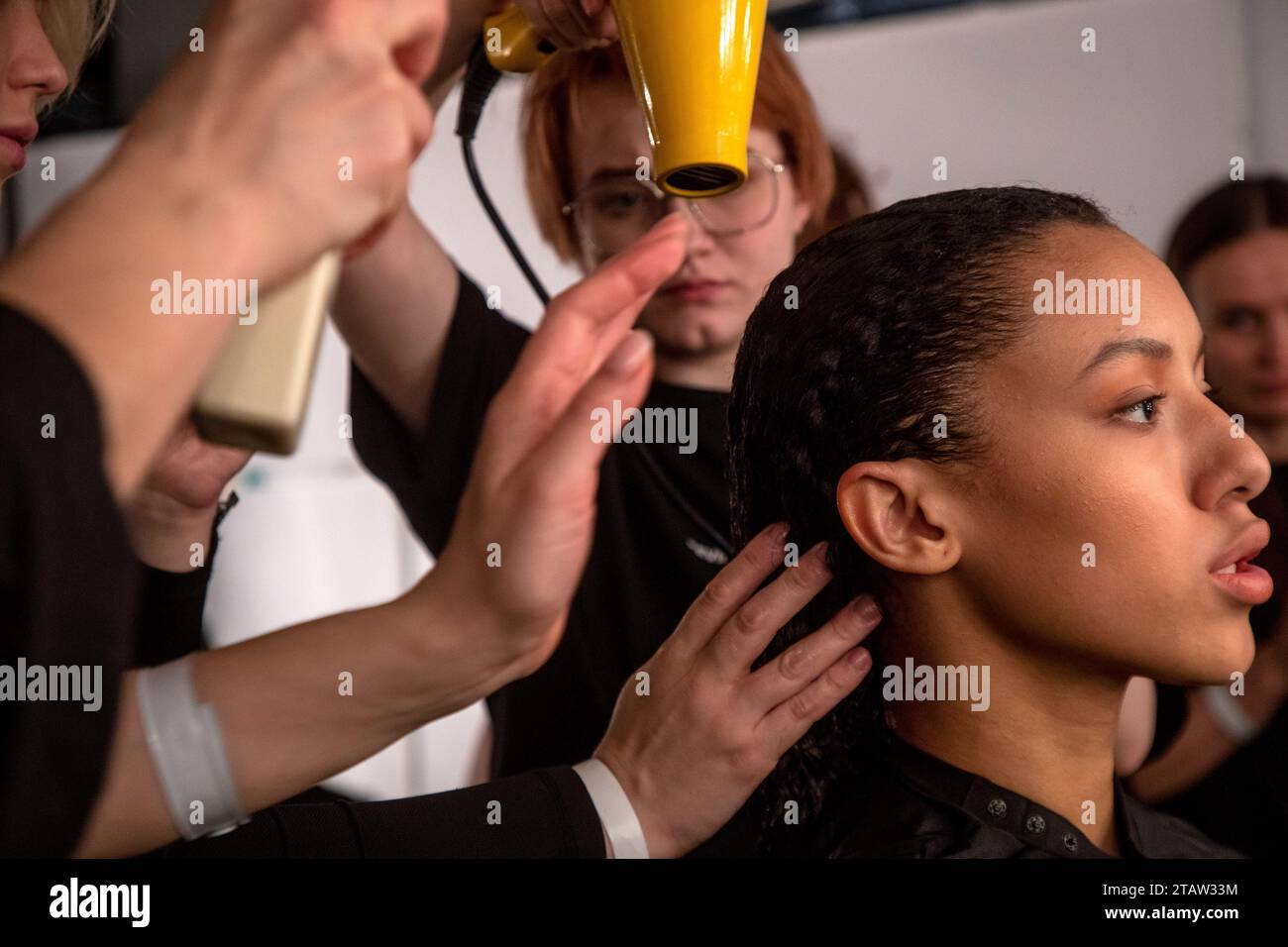 Moscow, Russia. 2nd of December, 2023. A model prepares backstage for ...