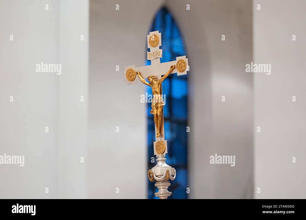 Rottenburg Am Neckar, Germany. 02nd Dec, 2023. An altar boy carries a ...