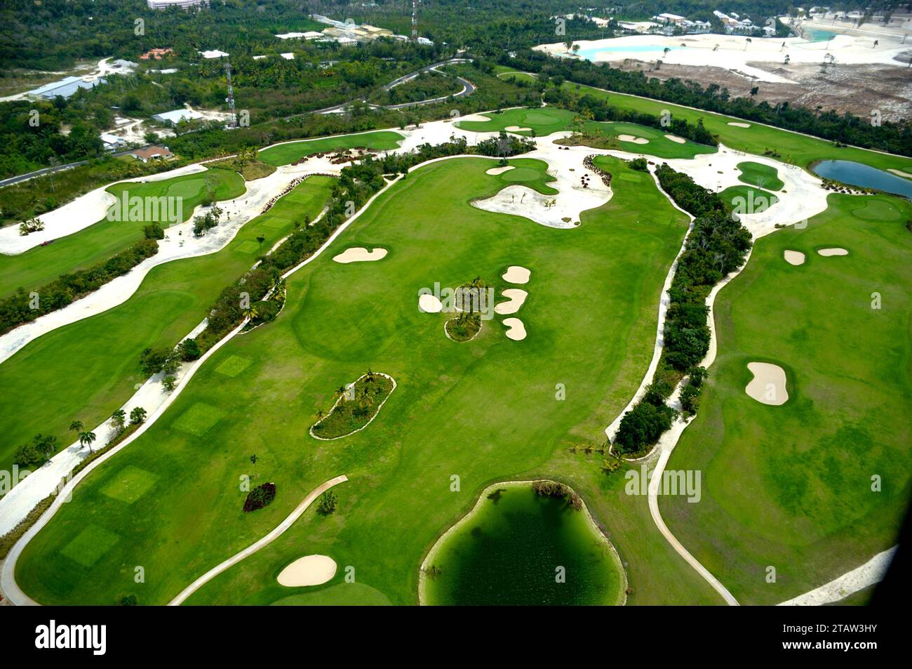 Flying above a golf course at an exotic destination Stock Photo - Alamy