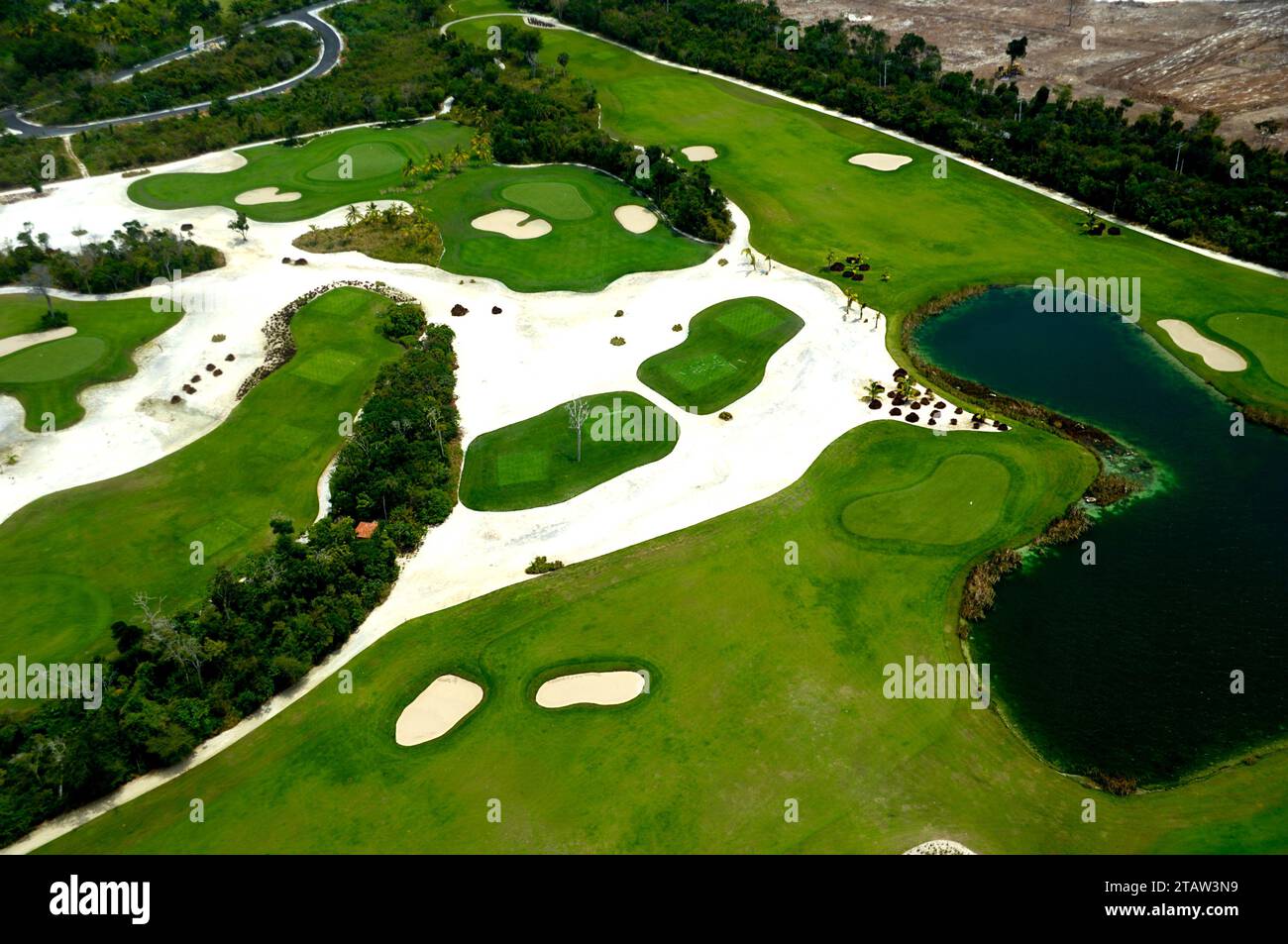 Flying above a golf course at an exotic destination Stock Photo - Alamy