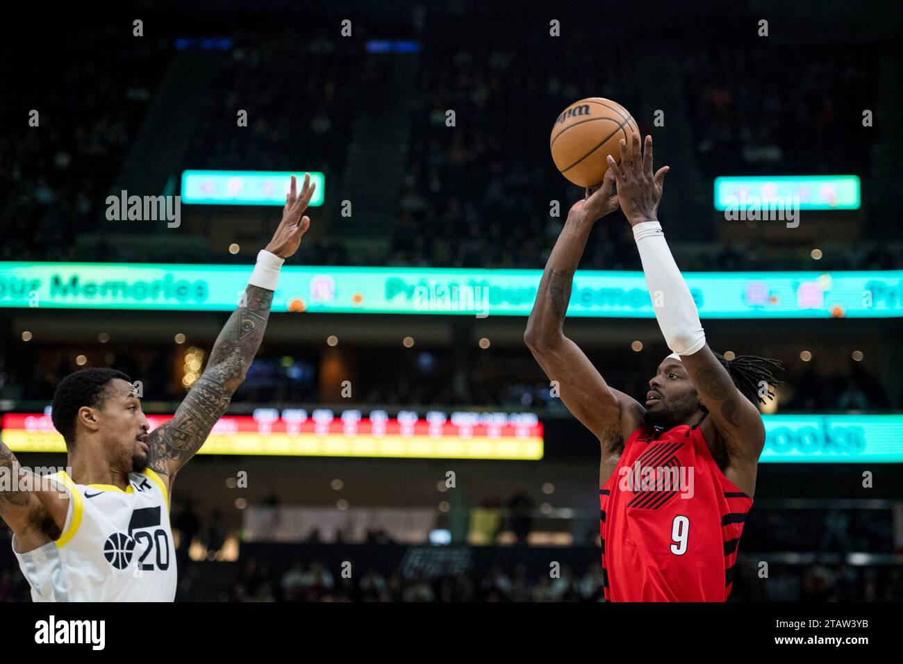 Portland Trail Blazers forward Jerami Grant (9) shoots while guarded by ... Portland Trail Blazers forward Jerami Grant (9) shoots while guarded by ...