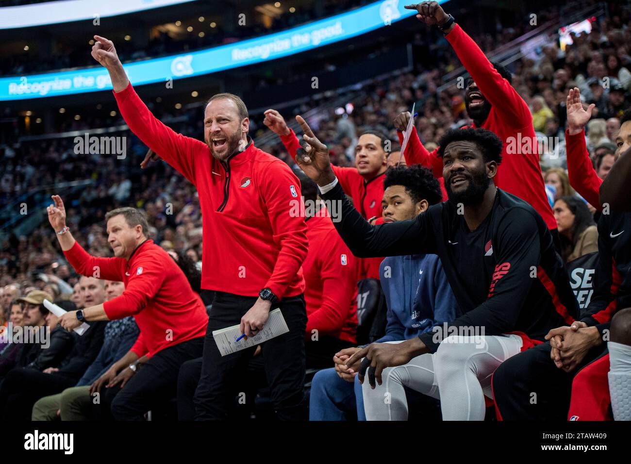 Portland Trail Blazers assistant coach Steve Hetzel, left, and others ...