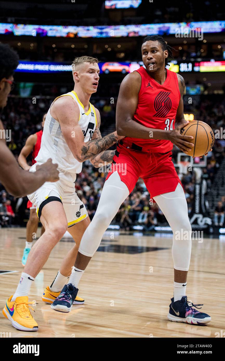 Portland Trail Blazers forward Jabari Walker (34) is guarded by Utah ...