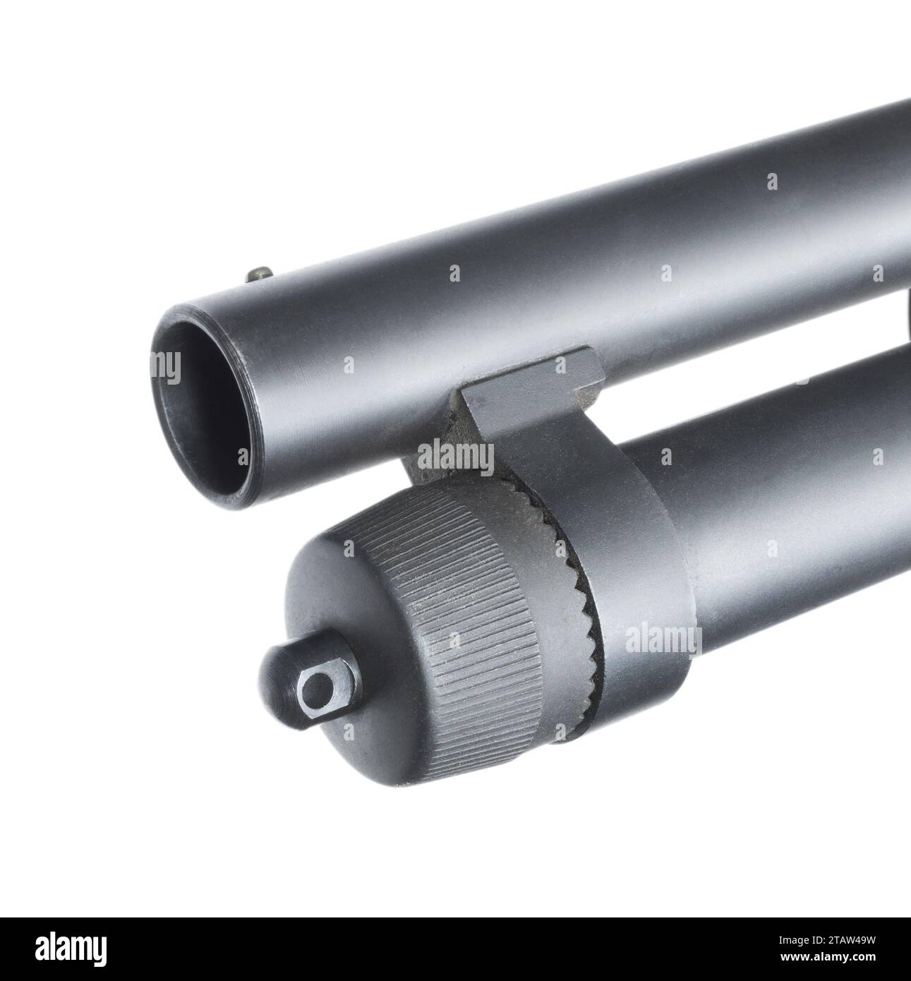 Close look at the muzzle and magazine cap on a black, tactical shotgun ...