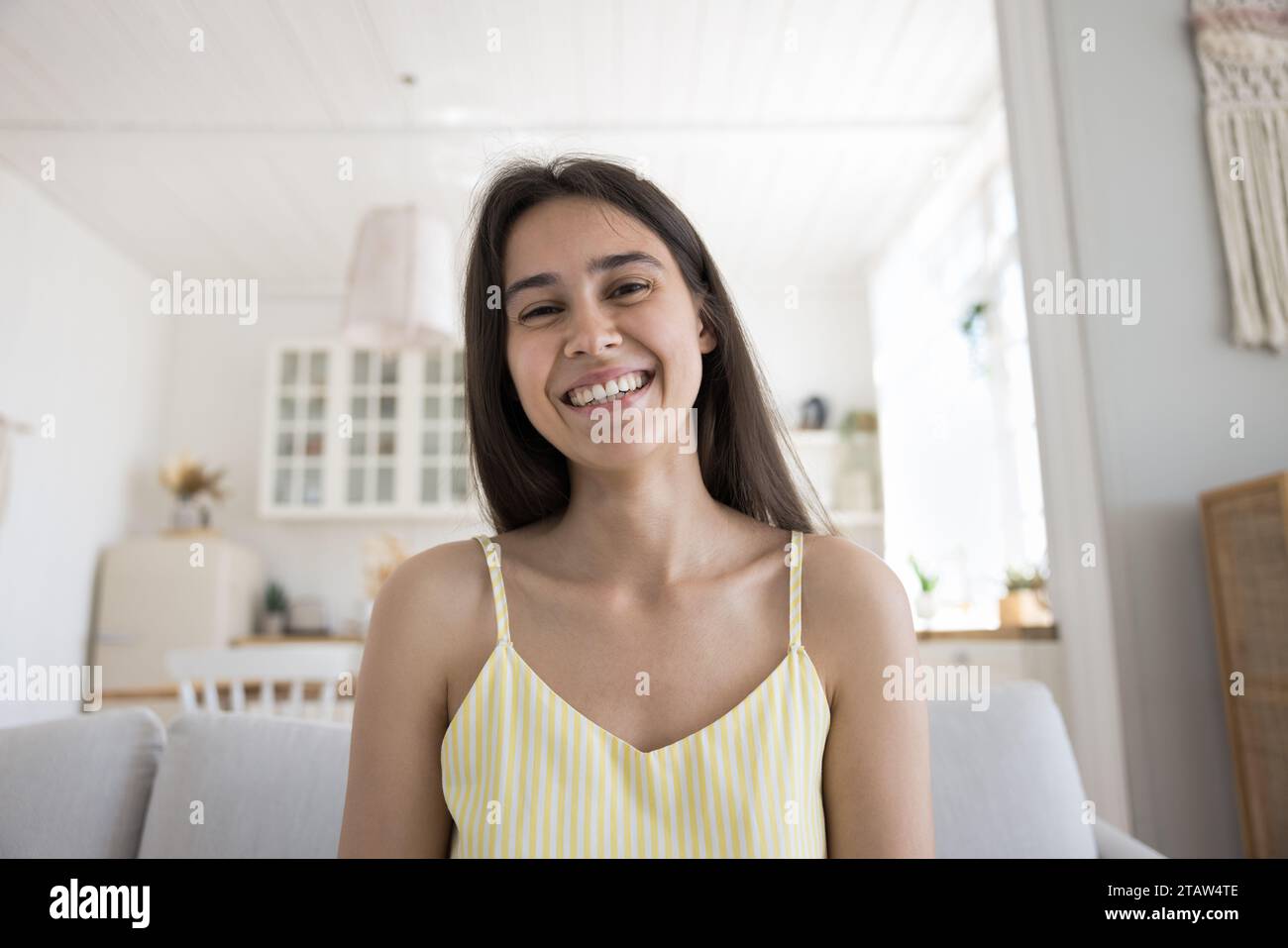 Head shot portrait attractive young woman staring at camera Stock Photo ...