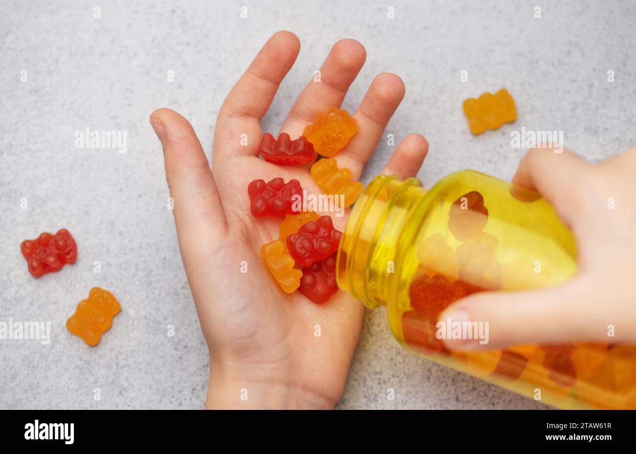 Gummy bears hand hi-res stock photography and images - Alamy