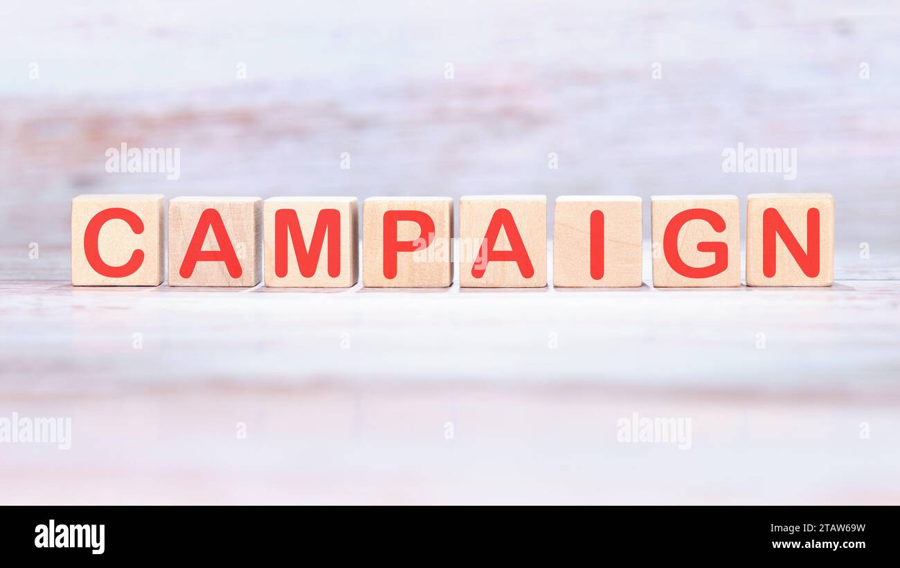 Campaign word made of wooden cubes on a light background Stock Photo ...
