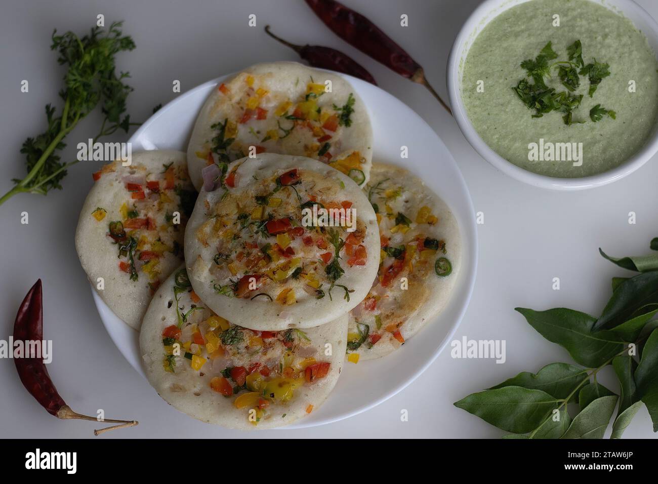 South Indian Uttapam. Healthy pan cake made of fermented batter of rice ...