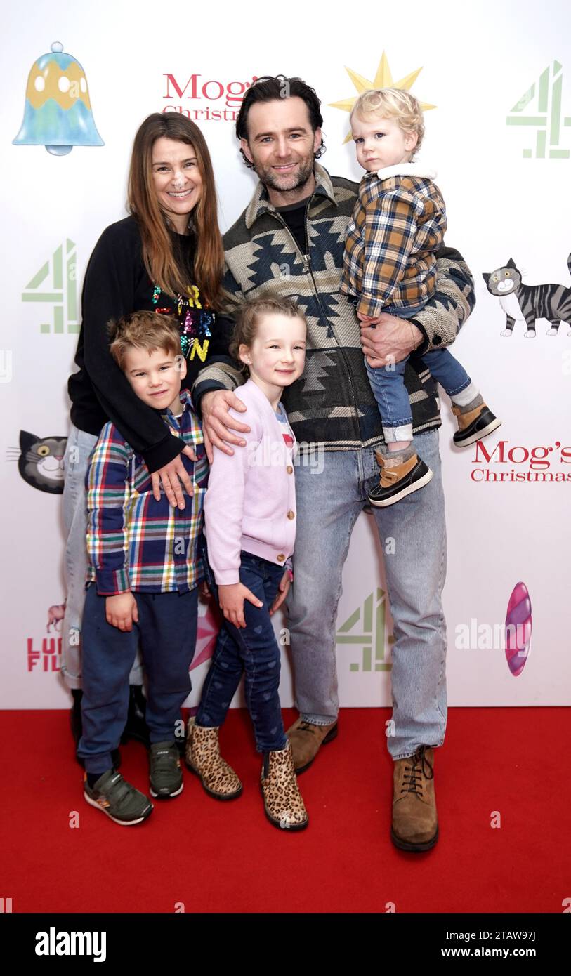 Harry Judd and Izzy with their children, arrive for the premiere of Mog ...