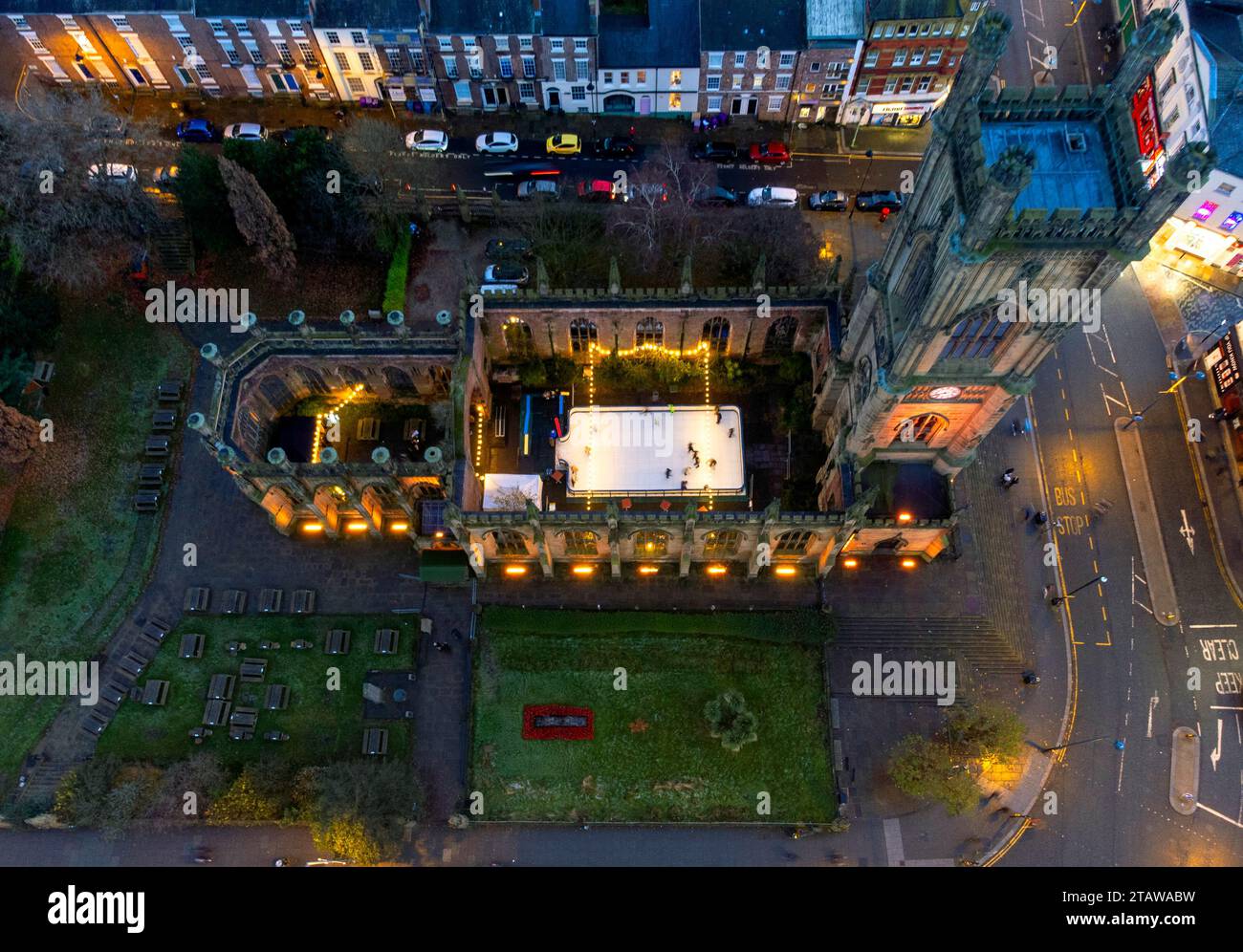 People skate on an ice rink that has been installed inside St Luke's ...