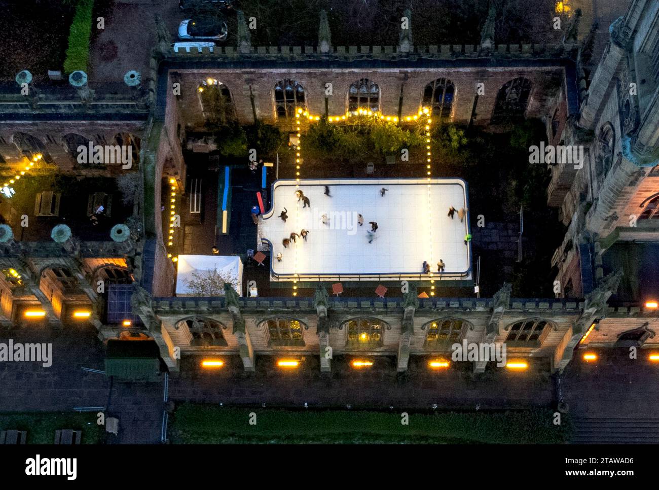 People skate on an ice rink that has been installed inside St Luke's ...