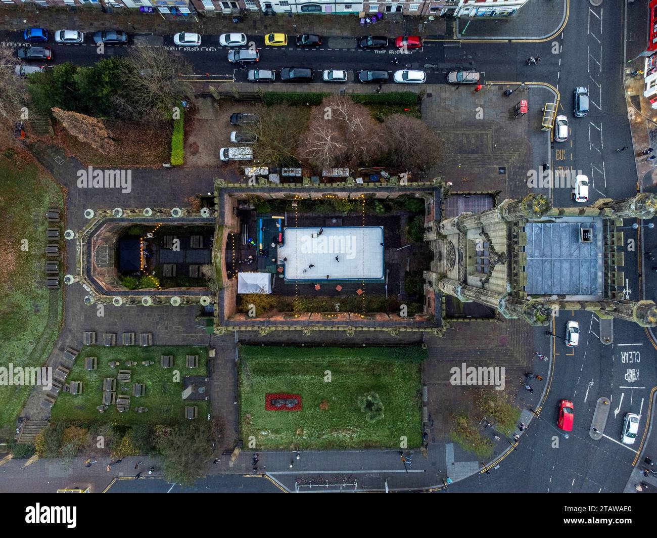 People skate on an ice rink that has been installed inside St Luke's ...