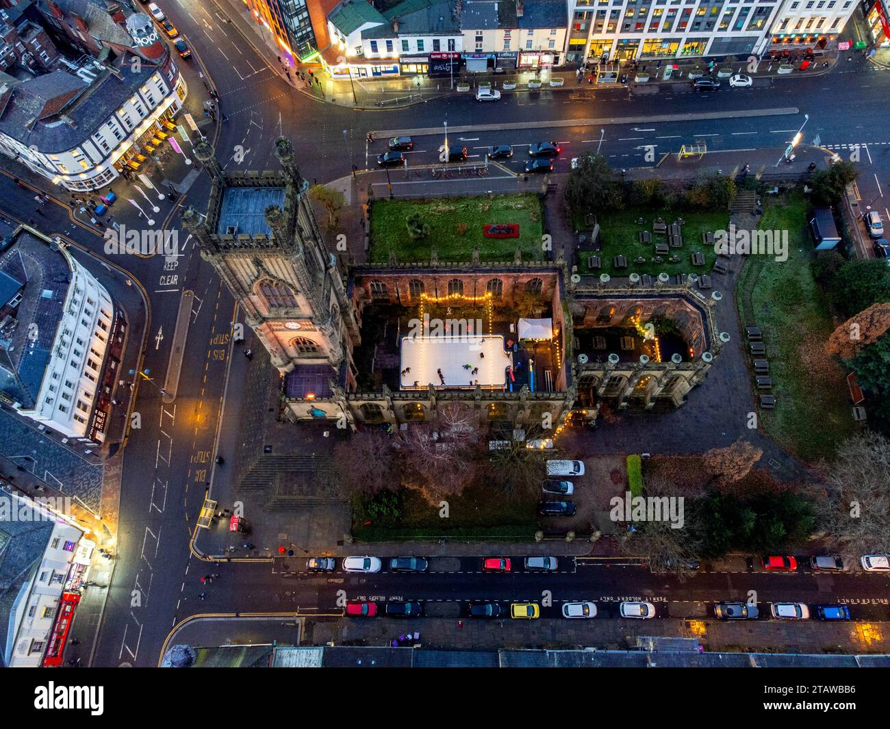 People skate on an ice rink that has been installed inside St Luke's ...