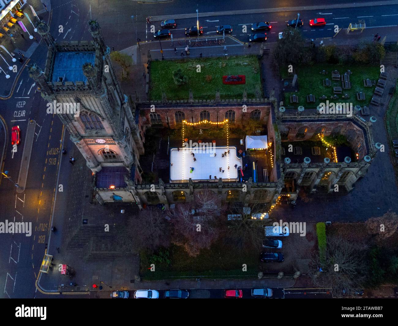 People skate on an ice rink that has been installed inside St Luke's ...