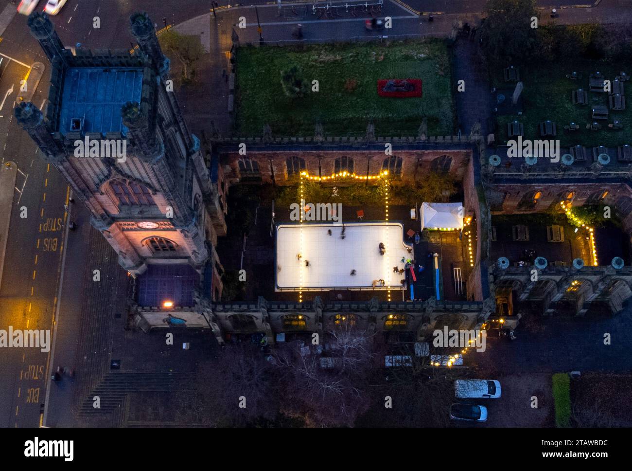 People skate on an ice rink that has been installed inside St Luke's ...