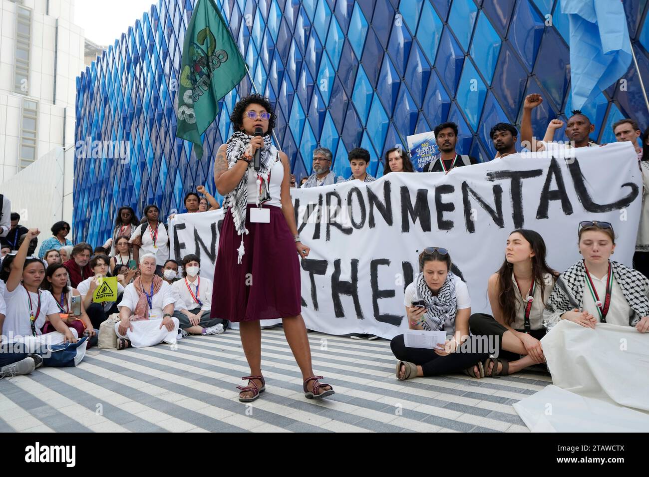 A pro-Palestinian demonstrator leads a protest against the Israel-Hamas ...