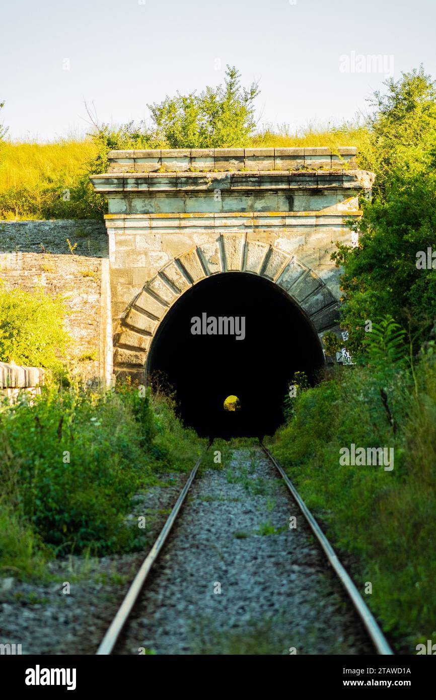 Beautiful entrance of a train tunnel, beautiful sun and nature ...