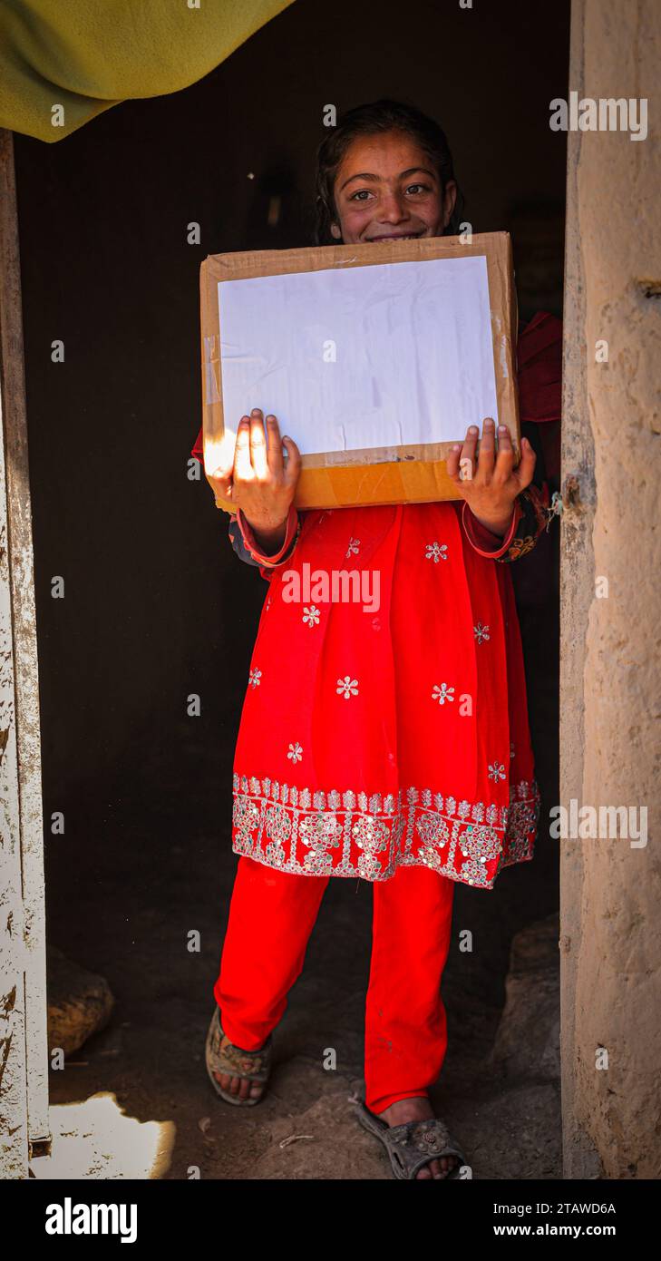 Needy Afghan girl receiving donations | Children expressing happiness ...
